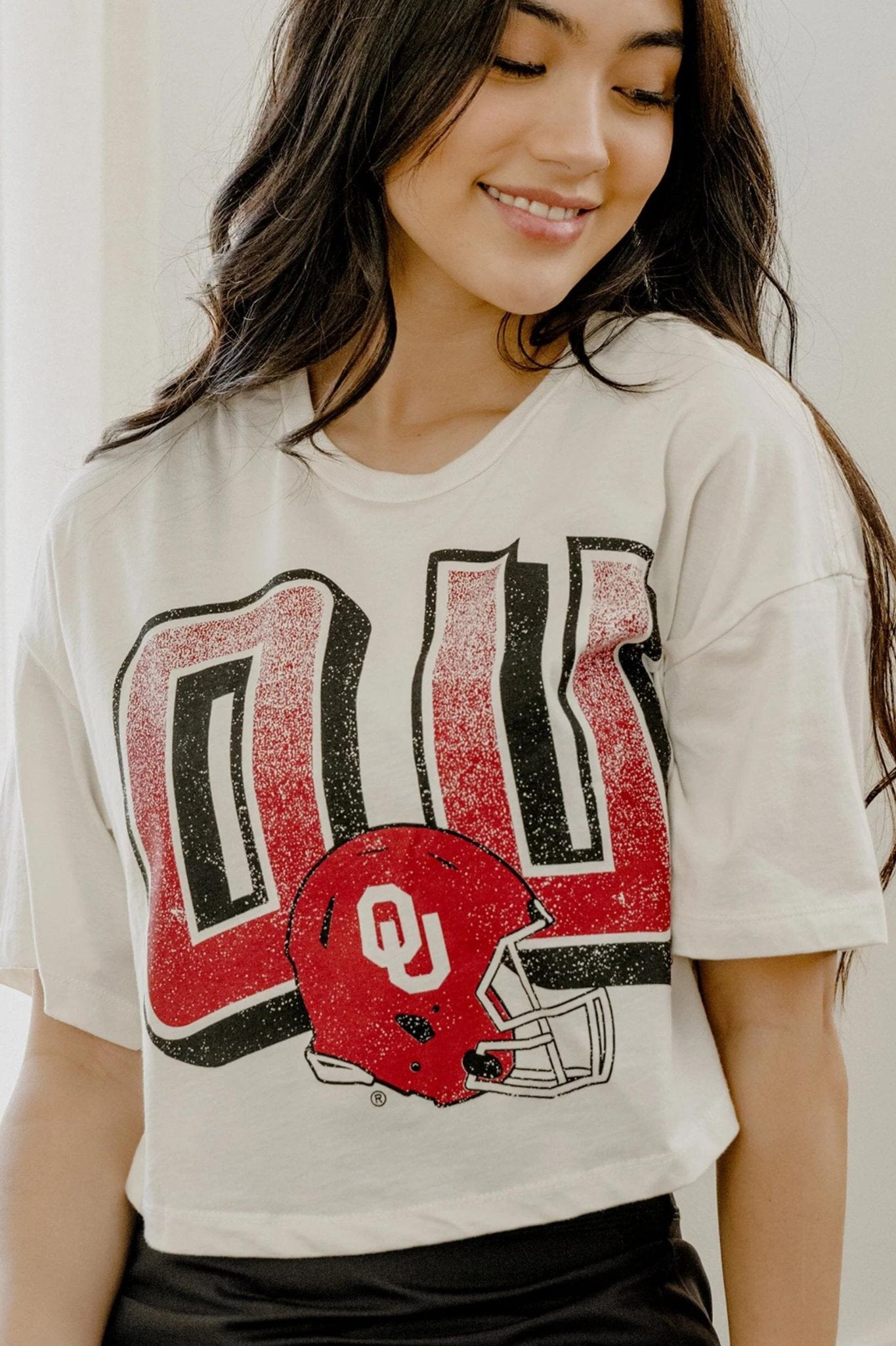 Livy Lu: Sooners Helmet Fade Cropped Tee in Off White - J. Cole Shoes